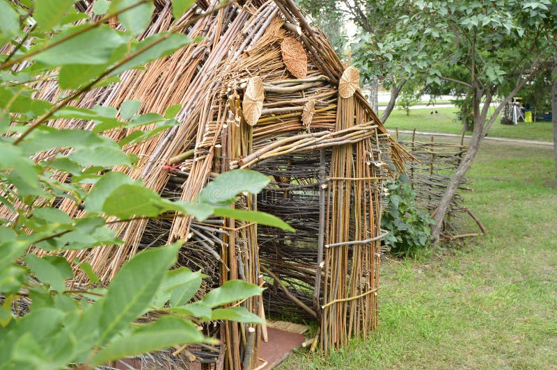 Authentic Hut from the Branches of the Forest, Summer Sunny Day Stock ...