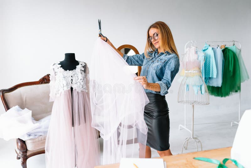 Authentic Image of a Fashion Designer Working in Her Studio Stock Image ...
