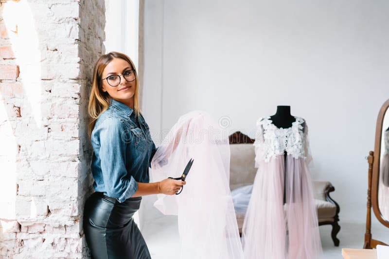 Authentic Image of a Fashion Designer Working in Her Studio Stock Photo ...