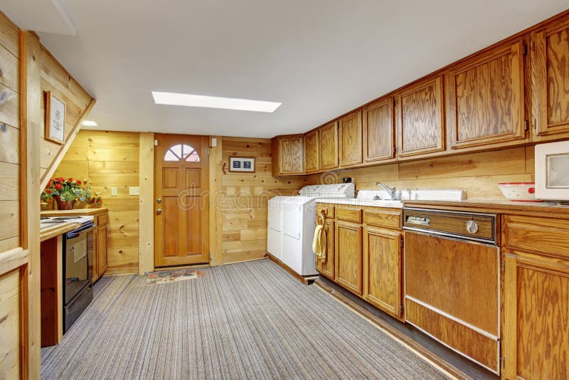 Authentic Kitchen Laundry Room Combo with Carpet. Stock Image - Image ...