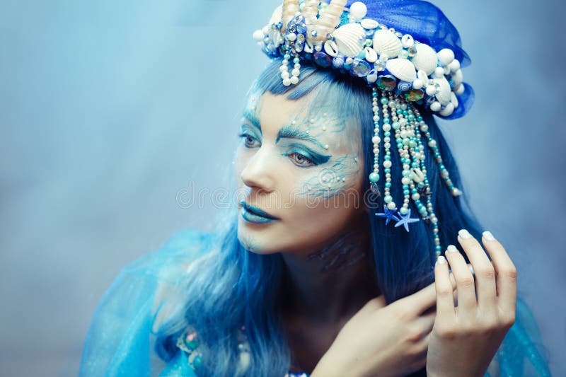 Authentic Looking Sea Queen with Striking Blue Makeup Stock Photo ...