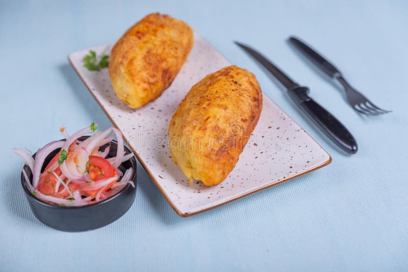 Authentic Peruvian Snack: Savory Stuffed Potato on Display. Stock Photo ...