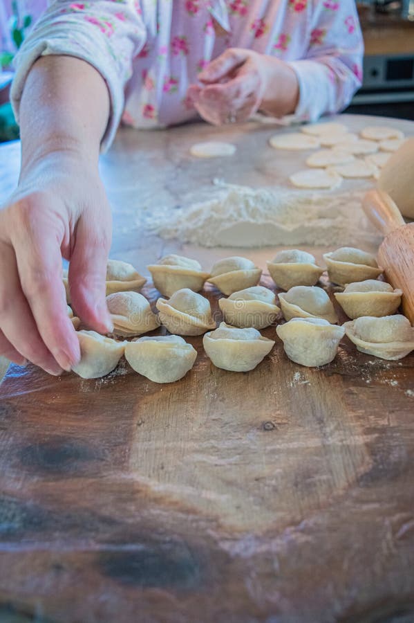Authentic Photo of Dumpling Making at Home. There is a Dough on the ...