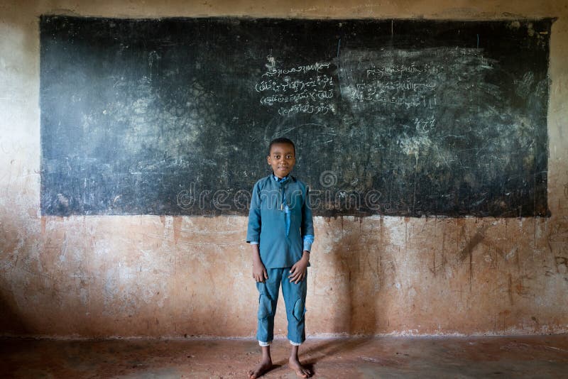 Authentic Poor Shool Classroom with Good Boys Studying Stock Photo ...