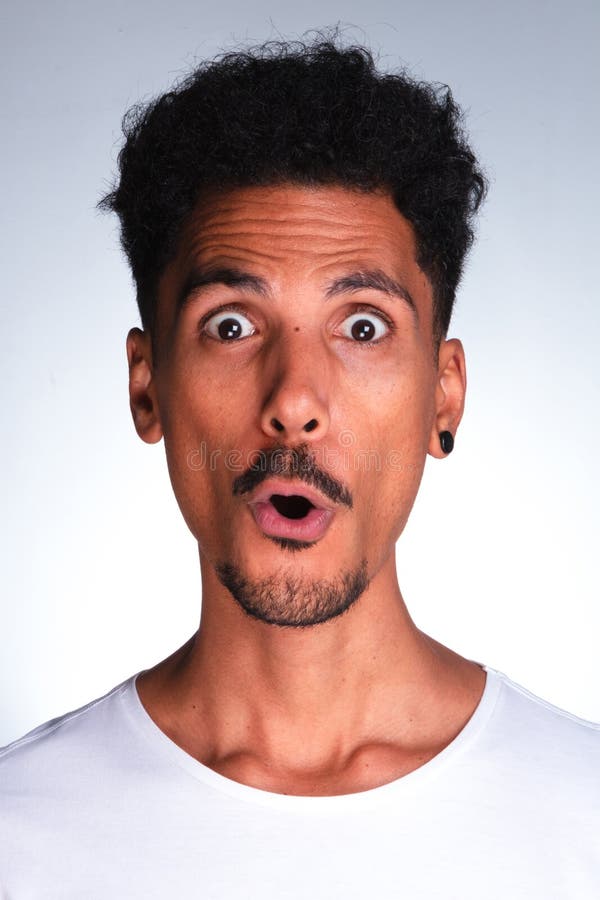 Authentic Portrait - Handsome Black Man Making Expressions with White ...