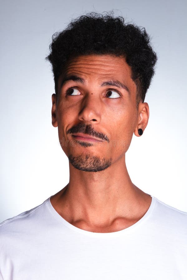 Authentic Portrait - Handsome Black Man Making Expressions with White ...