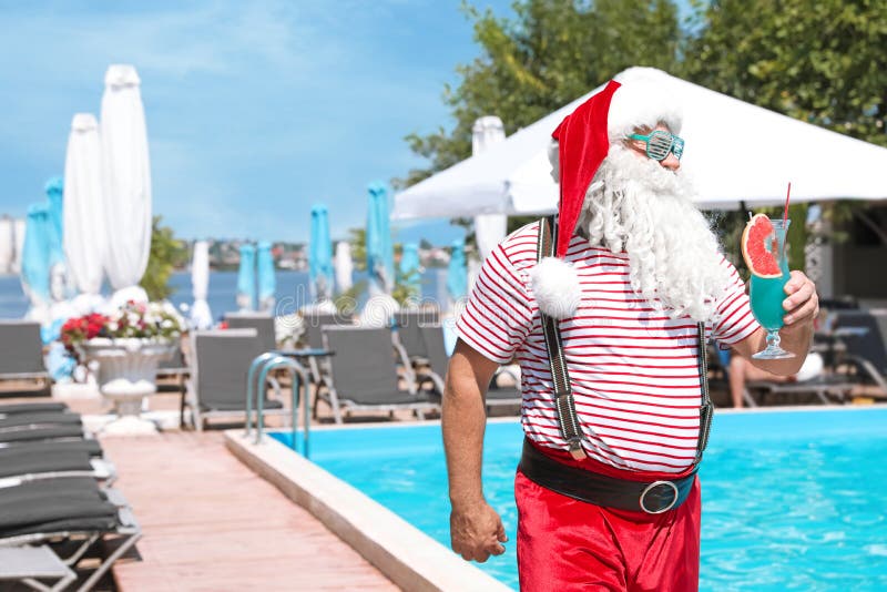Authentic Santa Claus with Cocktail Near Pool Stock Photo - Image of ...