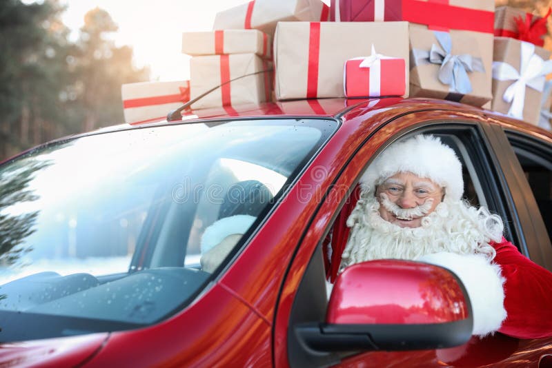Authentic Santa Claus Driving Car with Gift Boxes Stock Photo - Image ...