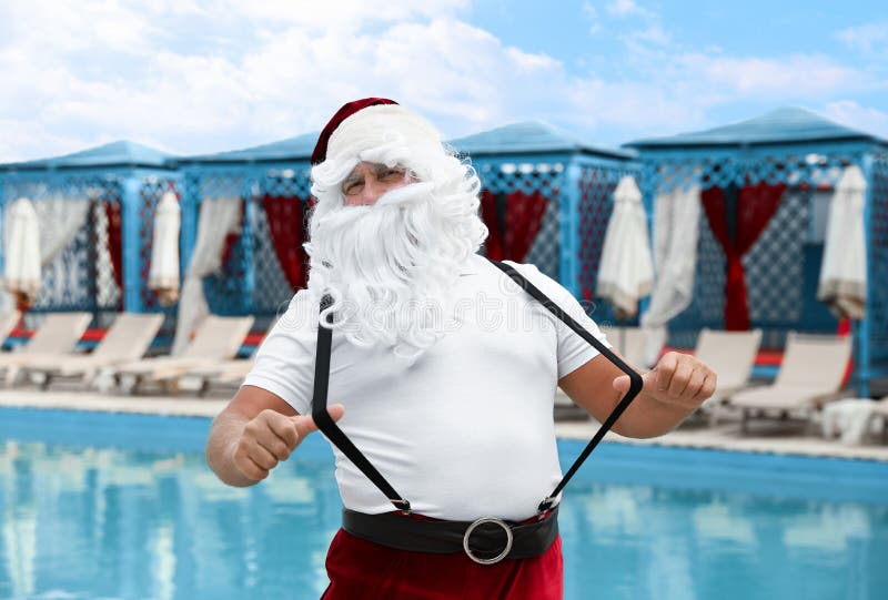 Authentic Santa Claus Having Fun Near Pool Stock Photo - Image of rest ...