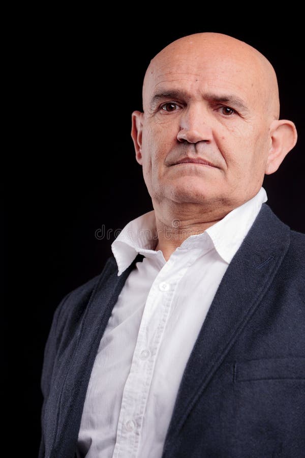 Authoritative Businessman Straightening Eyeglasses Stock Image - Image ...