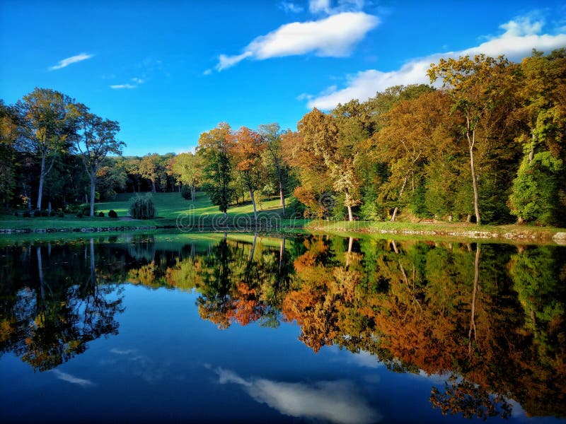 Autmn mirror photo stock image. Image of autumn, pond - 260679997