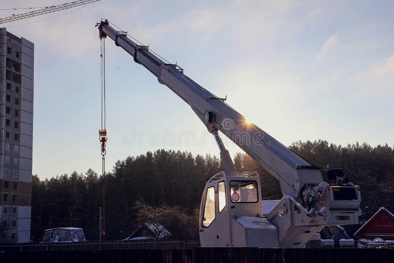 Auto Crane at Construction Site. Construction Machinery. Equipment for ...