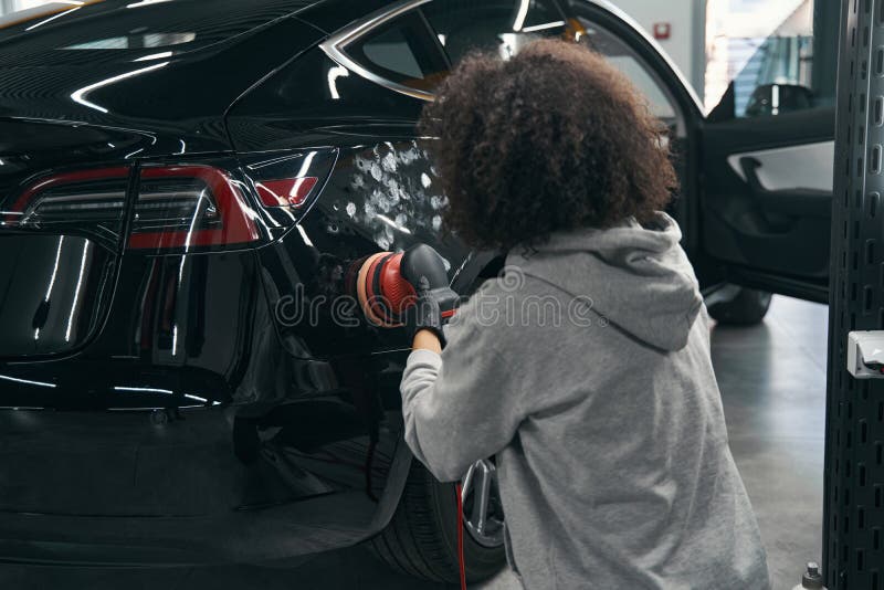 Auto Detailer Buffing Client Vehicle with Car Buffer Stock Image ...