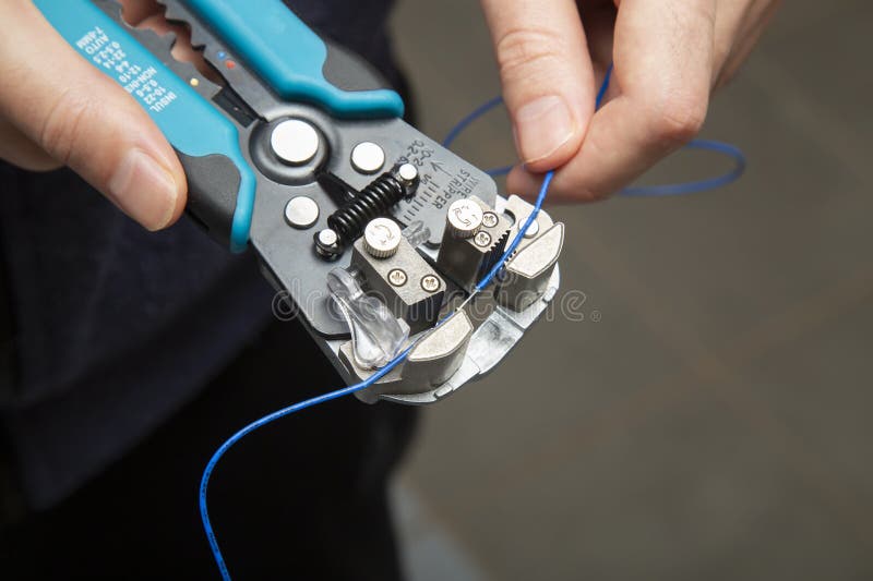 Auto Electrician Stripper. Removing Wire Insulation Stock Photo - Image ...