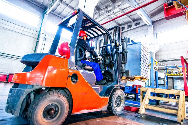 Auto Loader with Concrete Blocks in the Warehouse Factory Stock Image ...