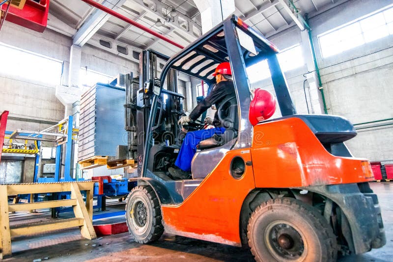 Auto Loader with Concrete Blocks in the Warehouse Factory Stock Image ...