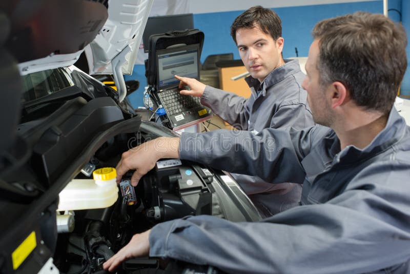Auto Mechanic Being Trained Stock Photo - Image of repair, working ...
