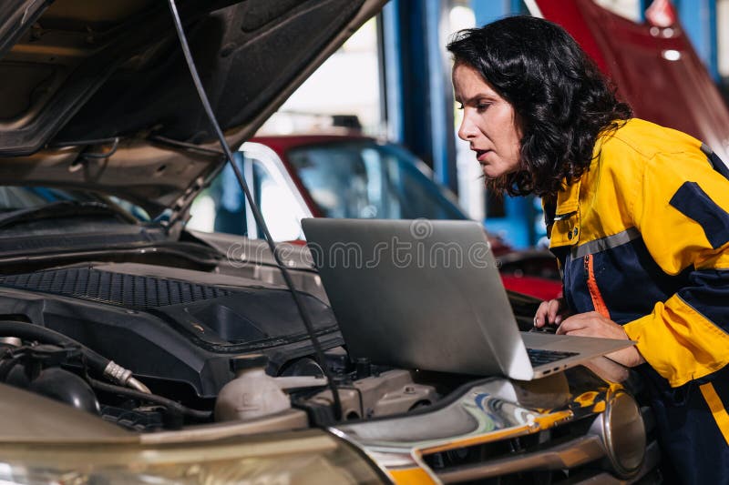 Auto Mechanic Car Engineer Using Laptop Computer Tuning ECU Diagnosis ...