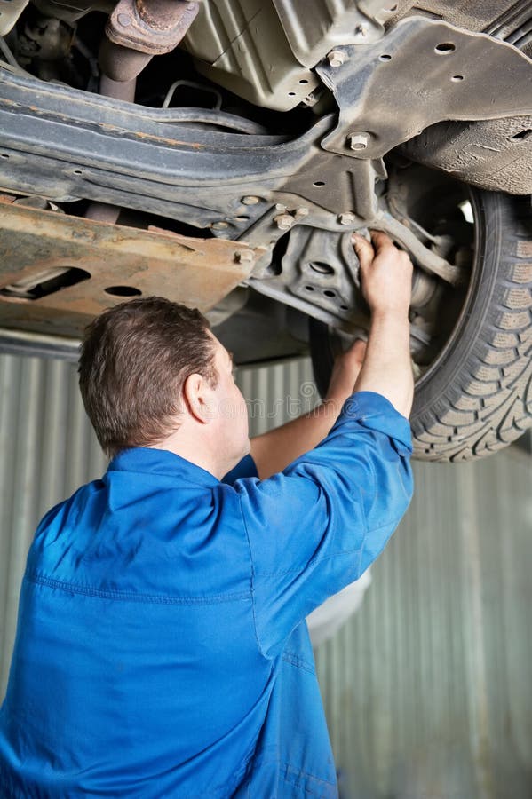 Auto Mechanic at Car Suspension Repair Work Stock Image - Image of ...