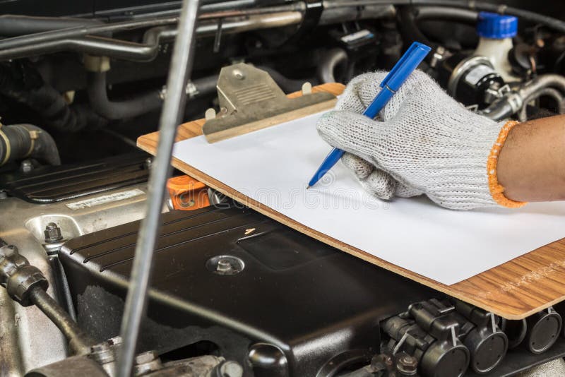 Auto Mechanic Checking Car Engine at the Garage Stock Photo - Image of ...