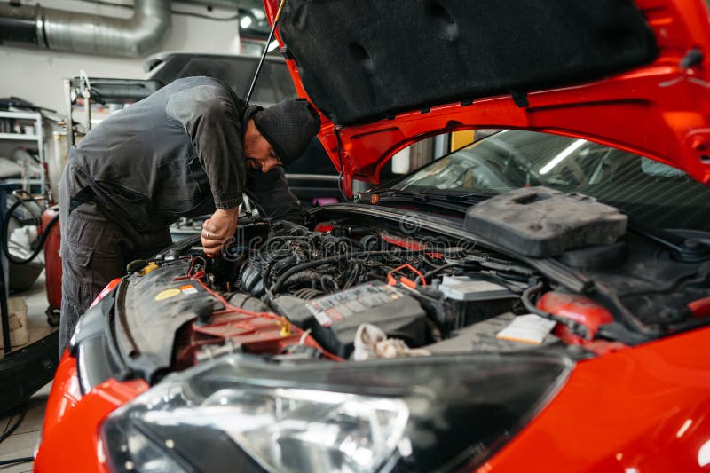 Auto Mechanic Checking Engine in Garage Repair Service Stock Photo ...