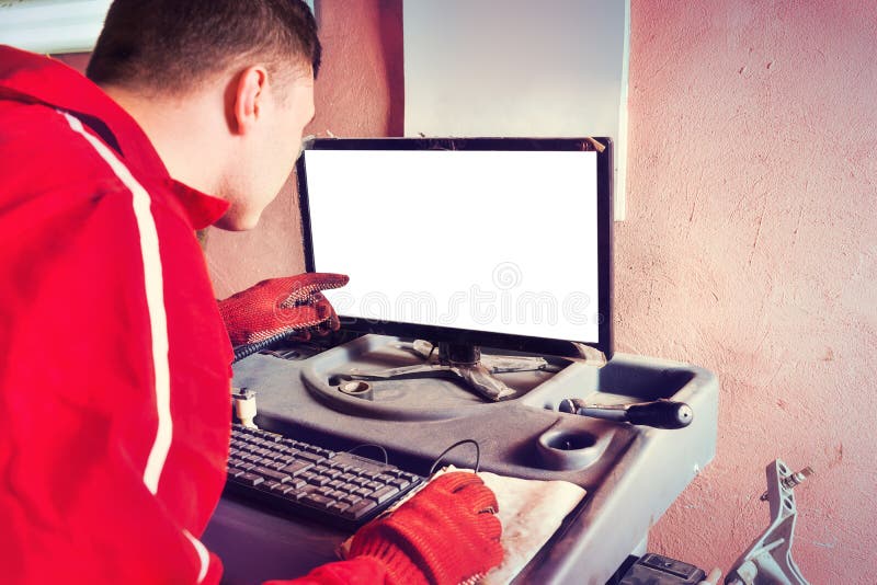 Auto Mechanic Checking the Readout on a Computer Stock Photo - Image of ...