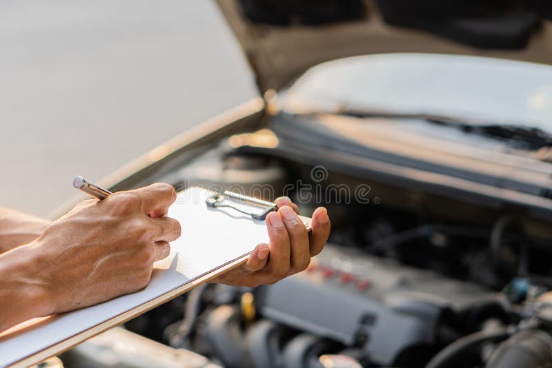 The Auto Mechanic Checks the Car Engine with the Check Written in the ...