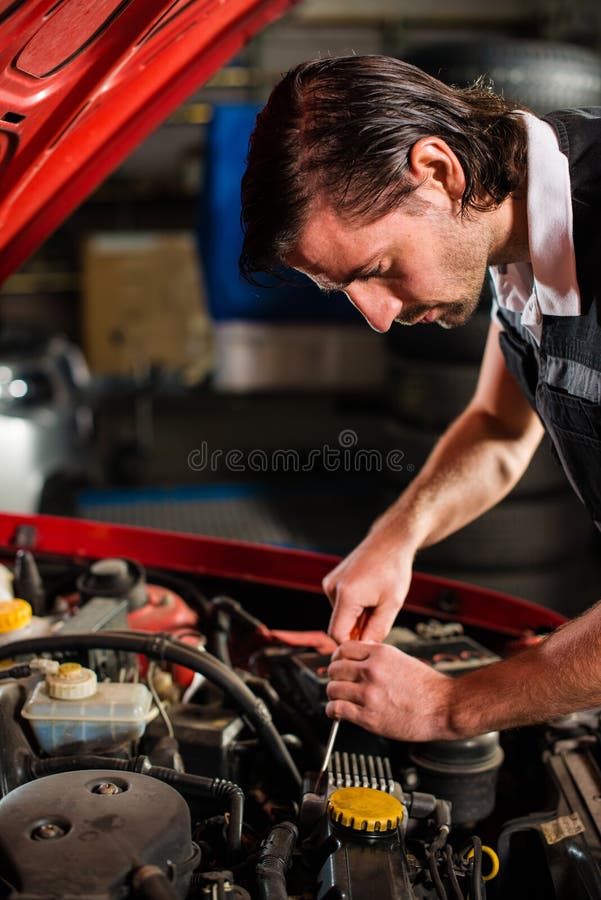 Auto Mechanic Fixing Car Engine Stock Photo - Image of repair, people ...