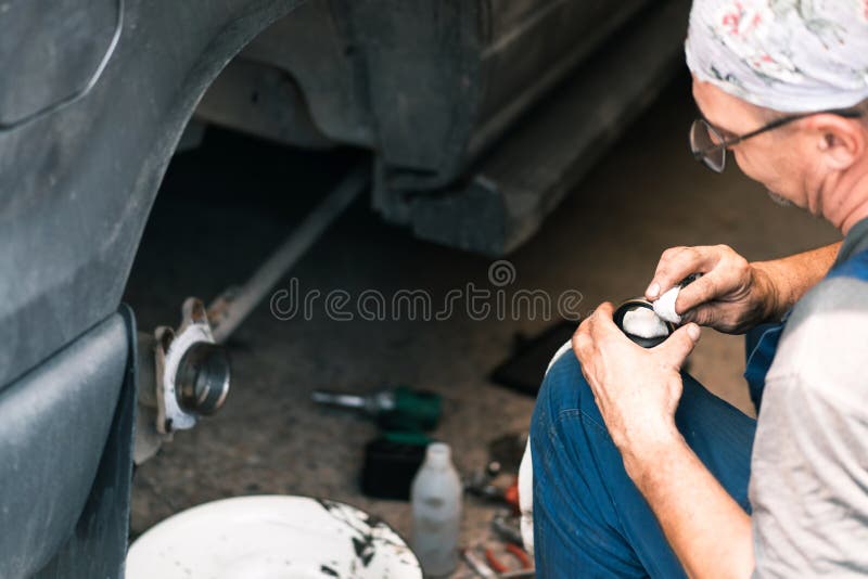 Auto Mechanic Repairing the Brake System of Car Stock Photo - Image of ...