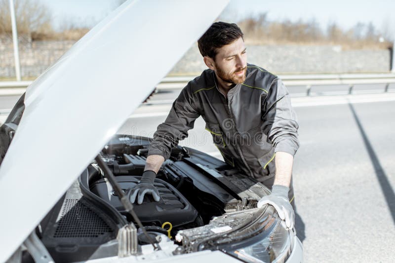 Auto Mechanic Repairing Car Outdoors Stock Image - Image of road ...