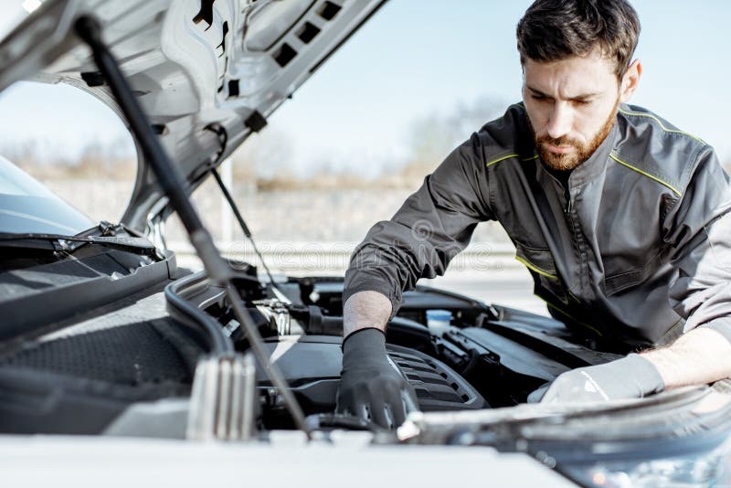 Auto Mechanic Repairing Car Outdoors Stock Image - Image of motor ...