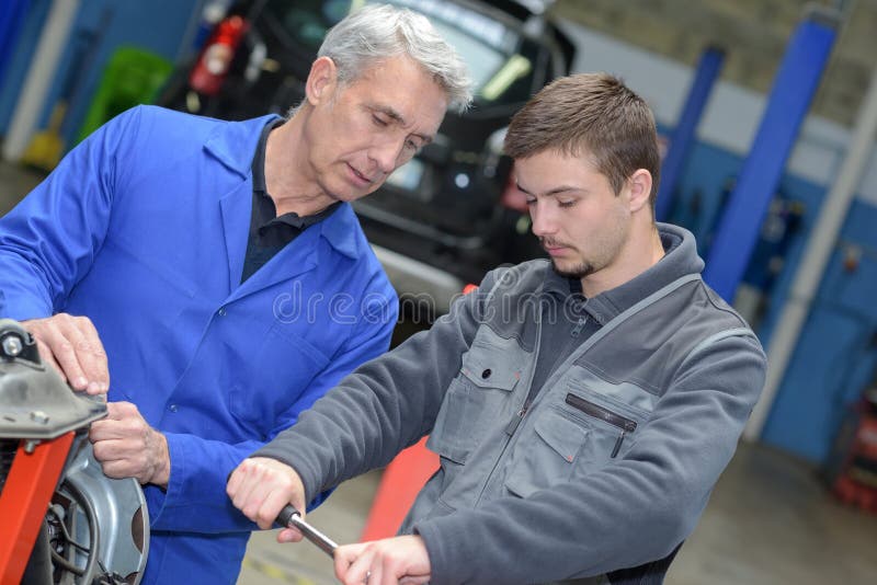 Auto Mechanic Shows Trainee Maintenance Car Engine Stock Photo - Image ...