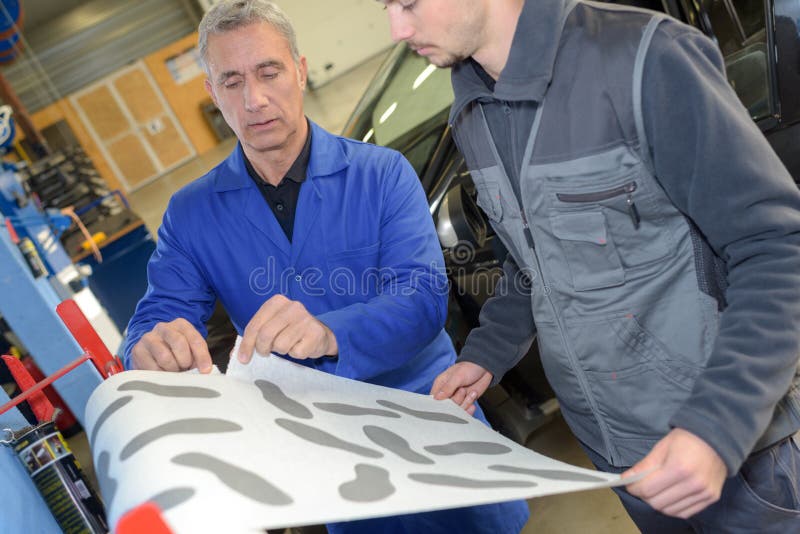 Auto Mechanic Shows Trainee Maintenance Car Stock Image - Image of team ...