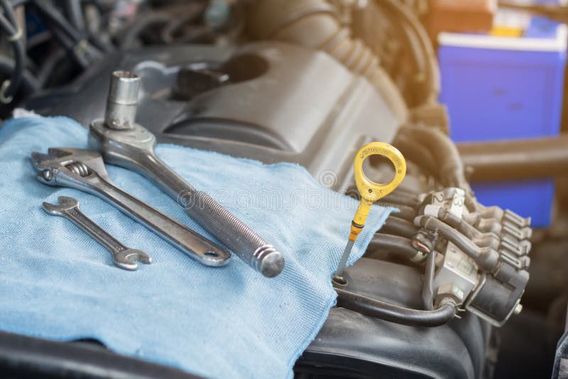 Auto Mechanic with Tool Working Check and Fixed an Old Car Engine at ...