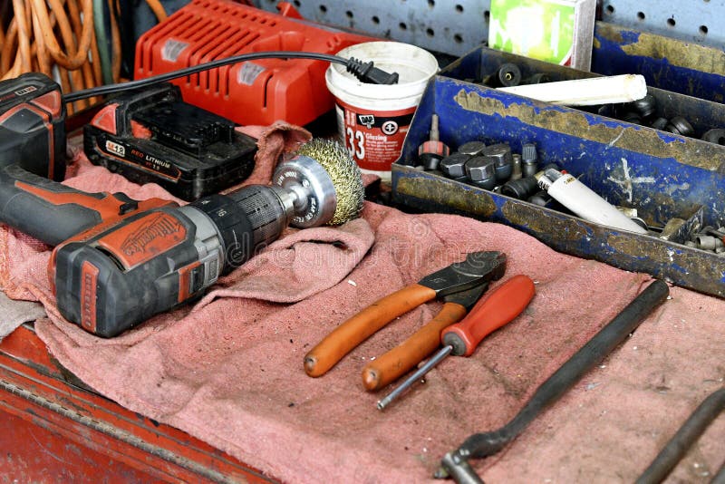 Auto Mechanic Tools on a Workbench with Pliers, Screwdriver, Wrench and ...