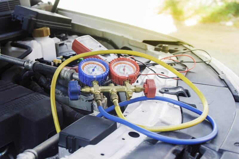 Auto Mechanic Uses a Pressure Gauge on the Air Compressor,liquid Air ...