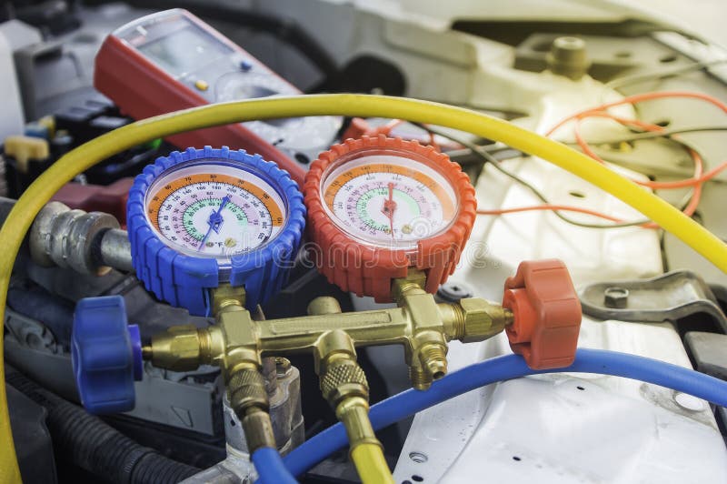 Auto Mechanic Uses a Pressure Gauge on the Air Compressor,liquid Air ...