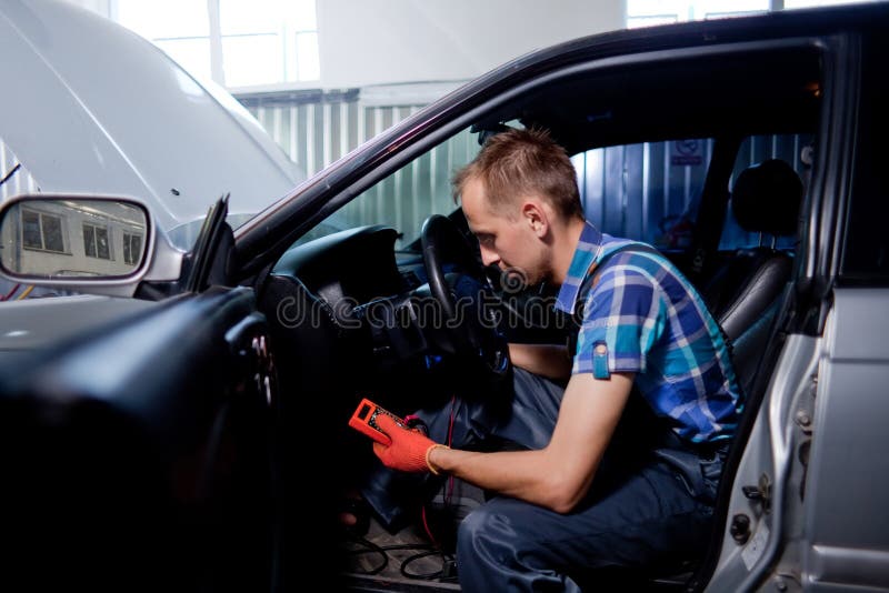 Auto Mechanic Worker in Garage. Stock Image - Image of automotive ...