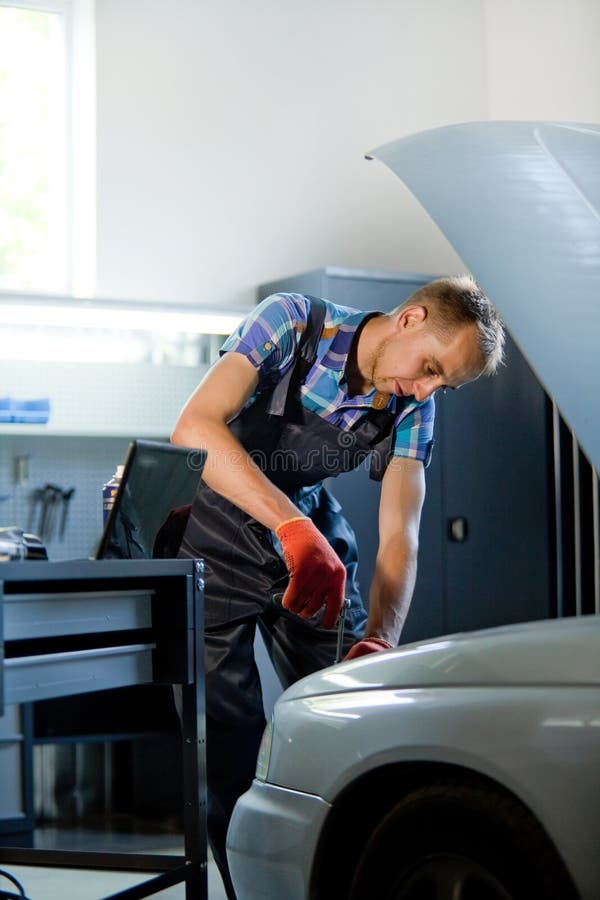 Auto Mechanic Worker in Garage. Stock Photo - Image of interior, person ...