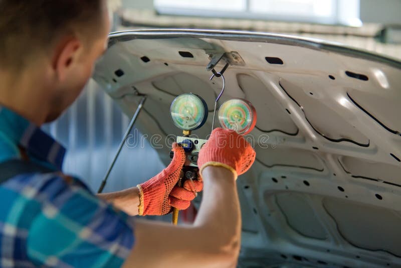 Auto Mechanic Worker in Garage. Stock Photo - Image of garage ...