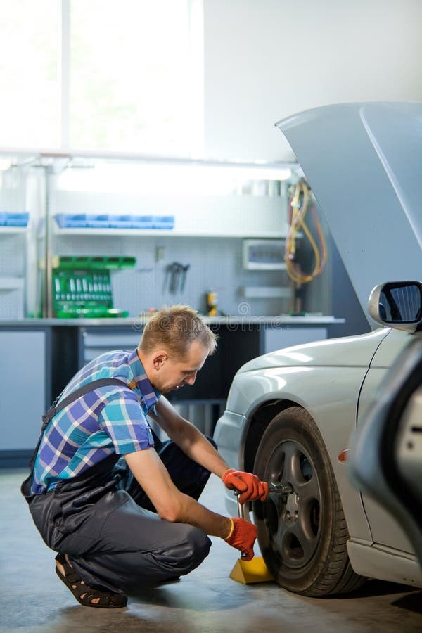 Auto Mechanic Worker in Garage. Stock Image - Image of automotive ...