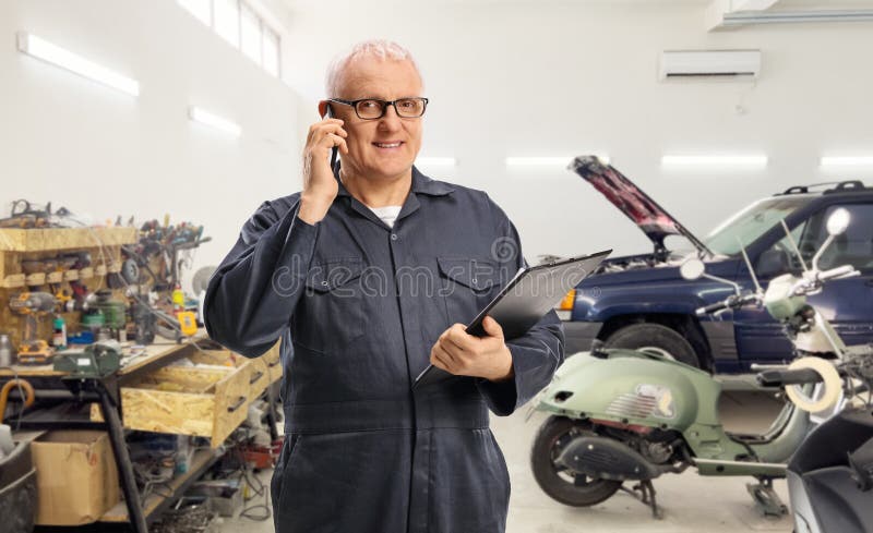 Auto Mechanic Worker Overall Uniform Making Phone Call Stock Photos ...