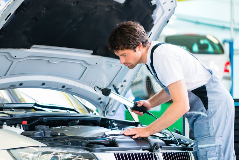 Auto Mechanic Working in Car Service Workshop Stock Image - Image of ...