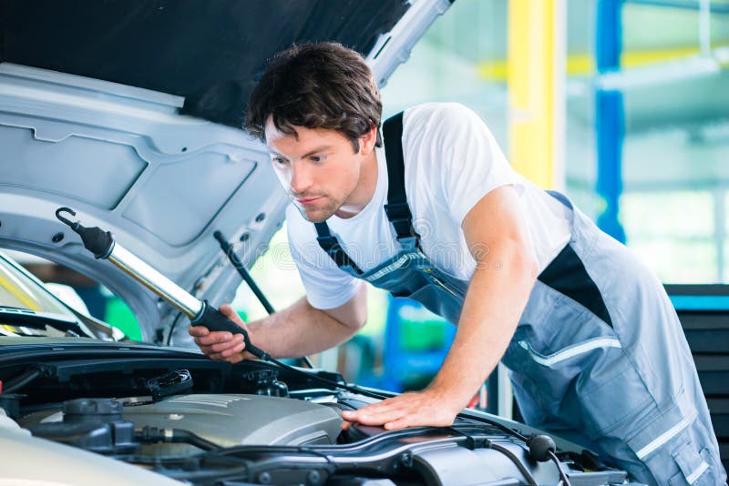 Auto Mechanic Working in Car Service Workshop Stock Photo - Image of ...
