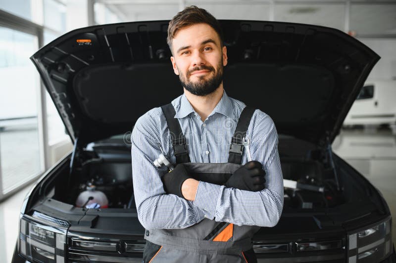 Auto Mechanic Working in Garage. Stock Photo - Image of inspection ...