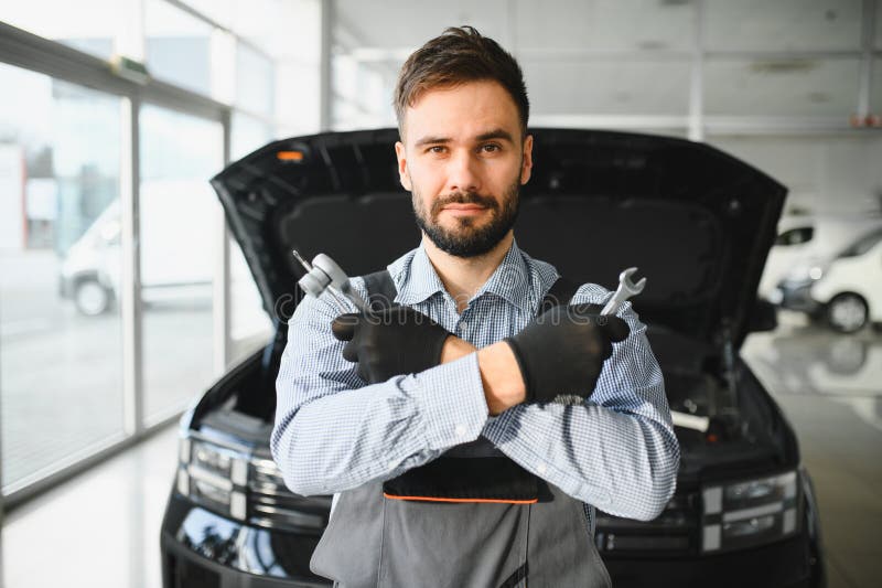 Auto Mechanic Working in Garage. Stock Photo - Image of professional ...