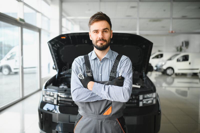 Auto Mechanic Working in Garage. Stock Image - Image of motor, garage ...