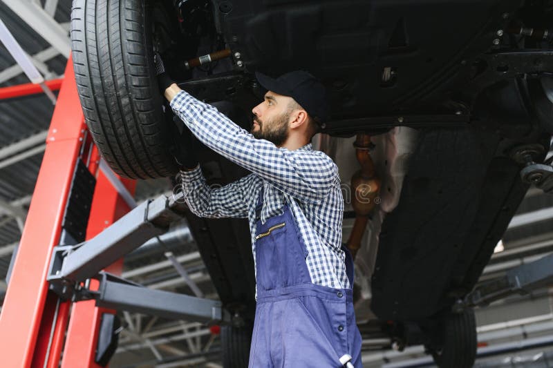 Auto Mechanic Working at Auto Repair Shop Stock Image - Image of ...