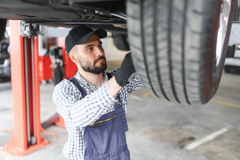 Auto Mechanic Working at Auto Repair Shop Stock Image - Image of ...
