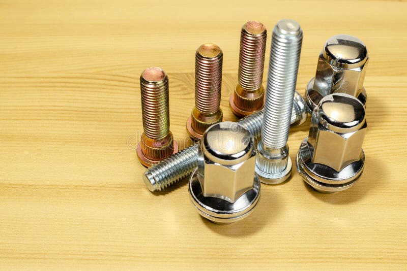 Auto Parts. Wheel Nut and Stud on a Wooden Table Stock Photo - Image of ...